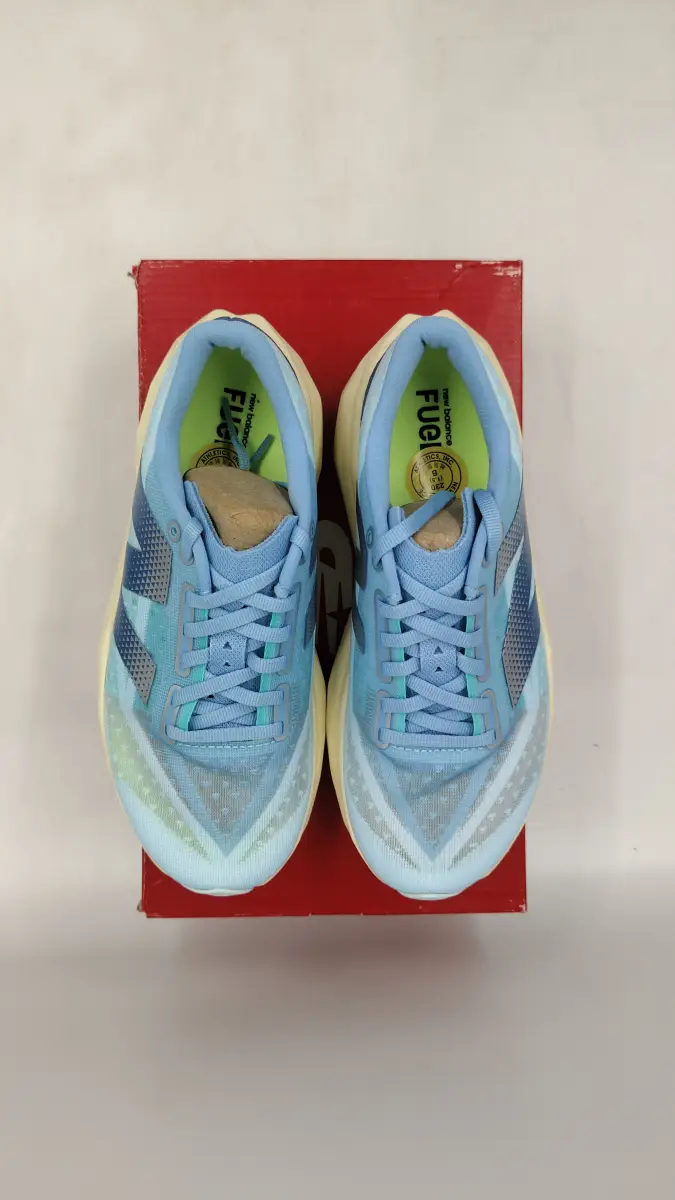83613 - New Balance Fuelcell Rebel V4 Quarry Blue (Womens) | Item ...